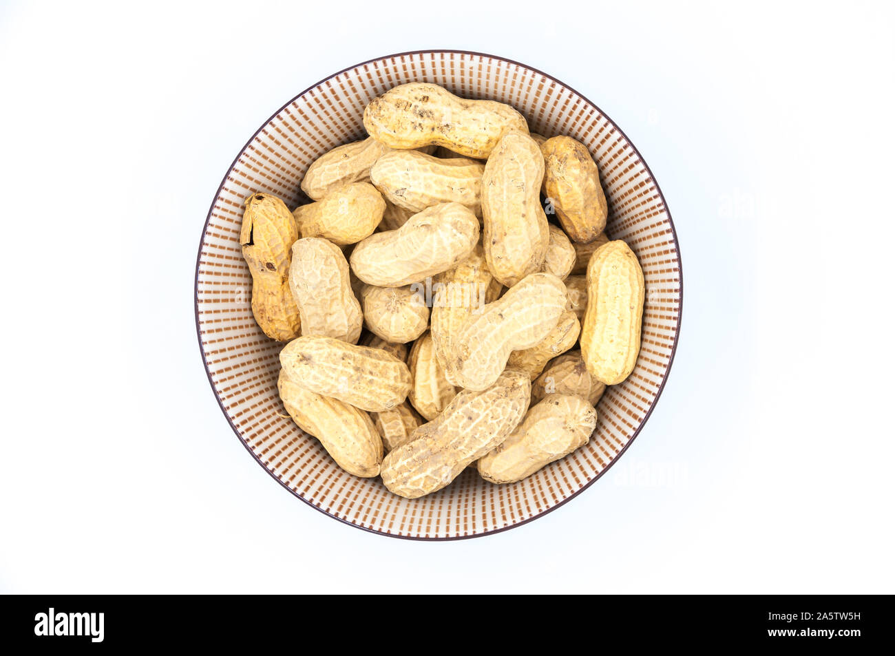 peanuts in shells in a bowl isolated on white background Stock Photo ...