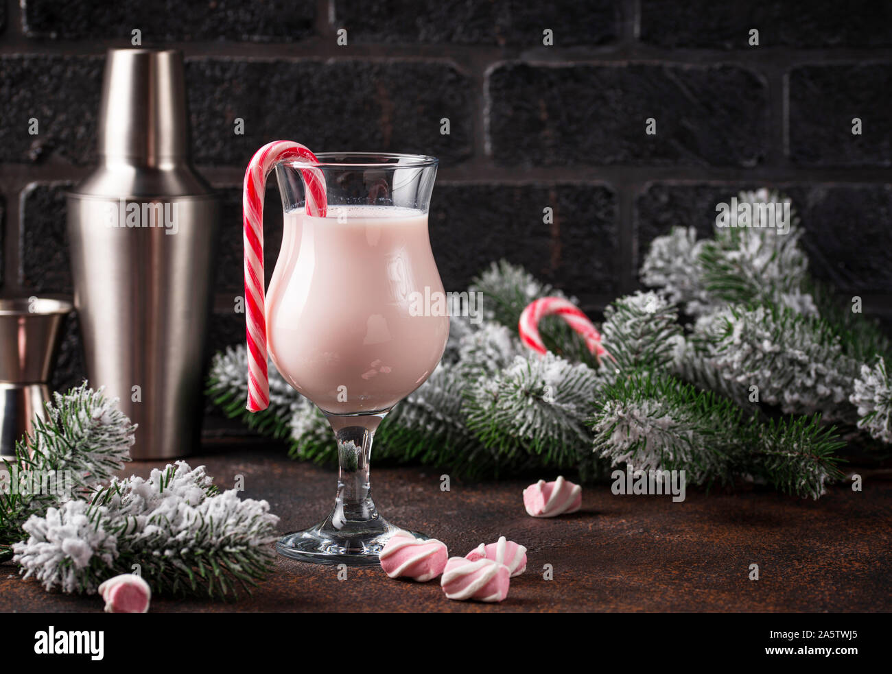 Pink Christmas cocktail with marshmallow Stock Photo - Alamy