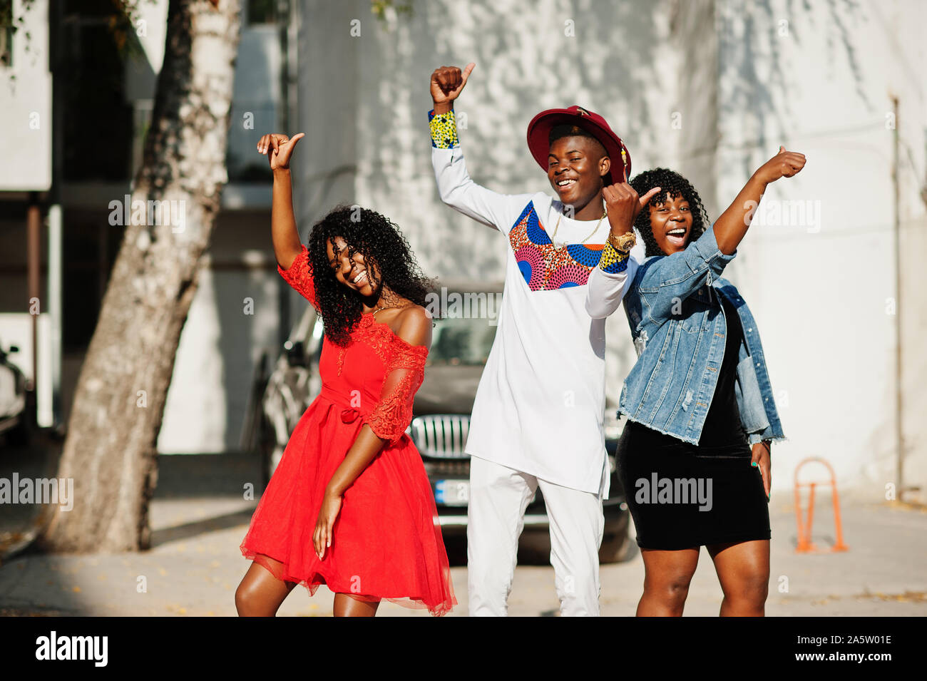 Group of three stylish trendy afro france friends posed at autumn day ...