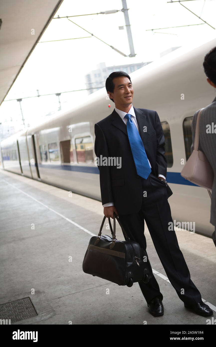 Standing on a train platform hi-res stock photography and images - Alamy
