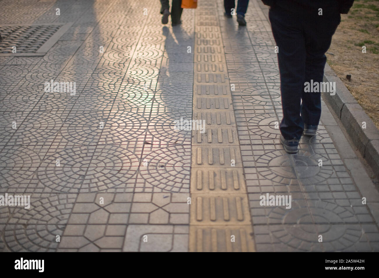 Paving on a city street Stock Photo - Alamy