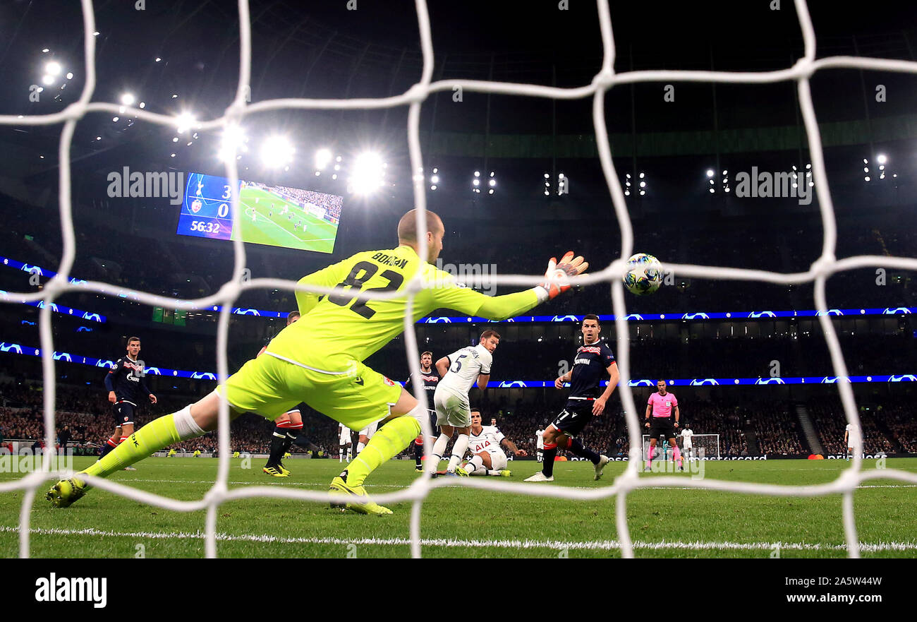 Tottenham Hotspur's Erik Lamela (centre on floor) scores his side's ...