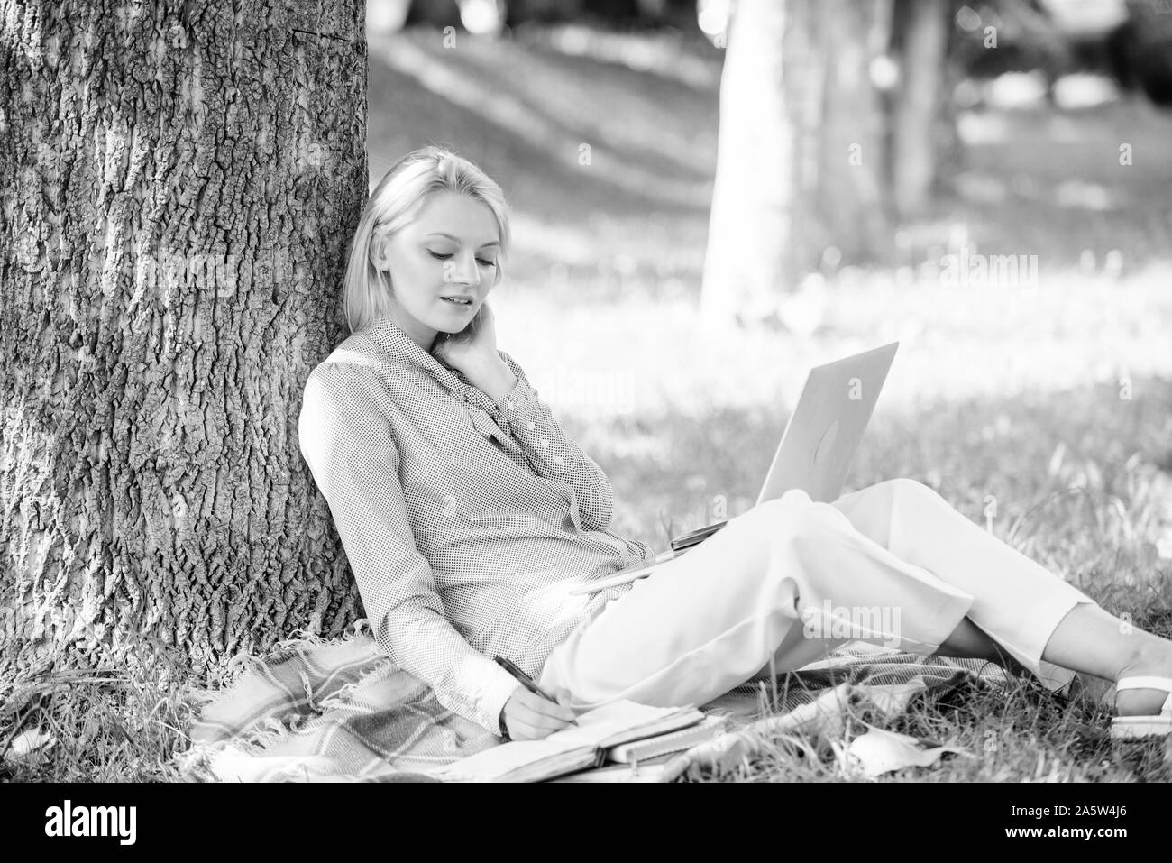 Natural environment office. Work outdoors benefits. Woman with laptop ...