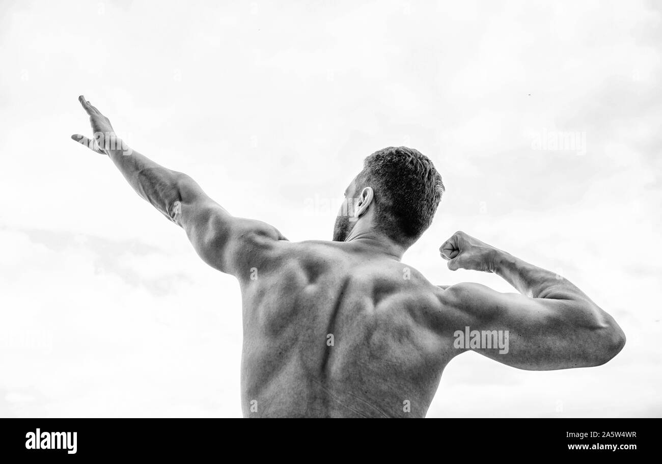 Bodybuilder strong muscular back feeling powerful and superior. Achieve ...