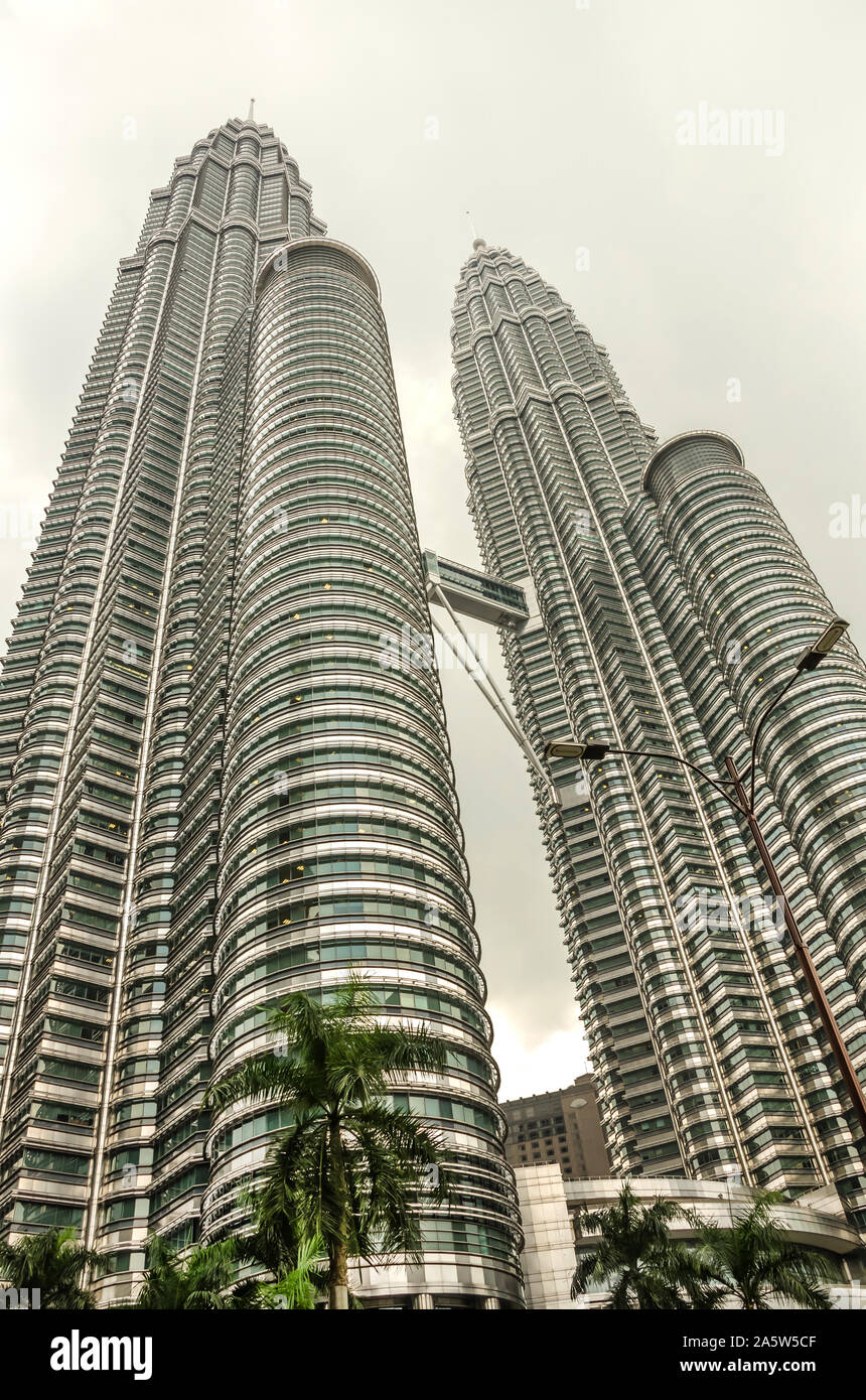 KUALA LAMPUR, MALAYSIA - DECEMBER 19, 2018: Petronas Towers are twin ...