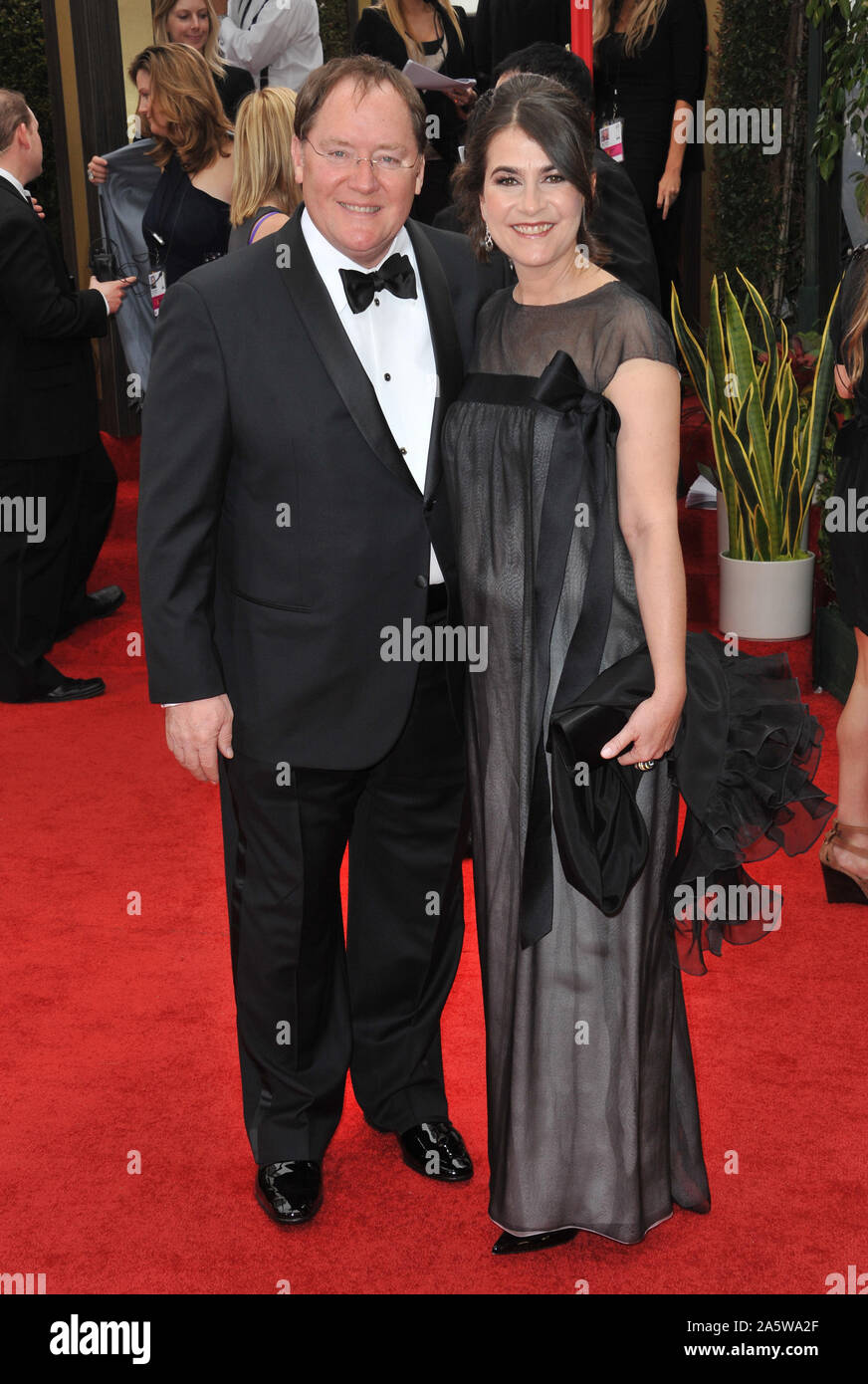 LOS ANGELES, CA. January 15, 2012: John Lasseter & Wife at the 69th ...