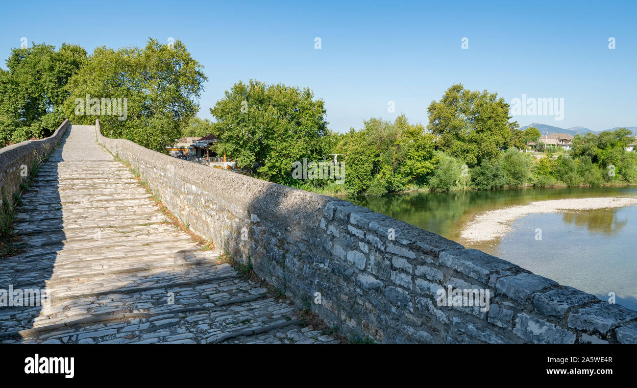 Ancient pedestrian stone bridge at Arta over Arachthos River in Pindus ...