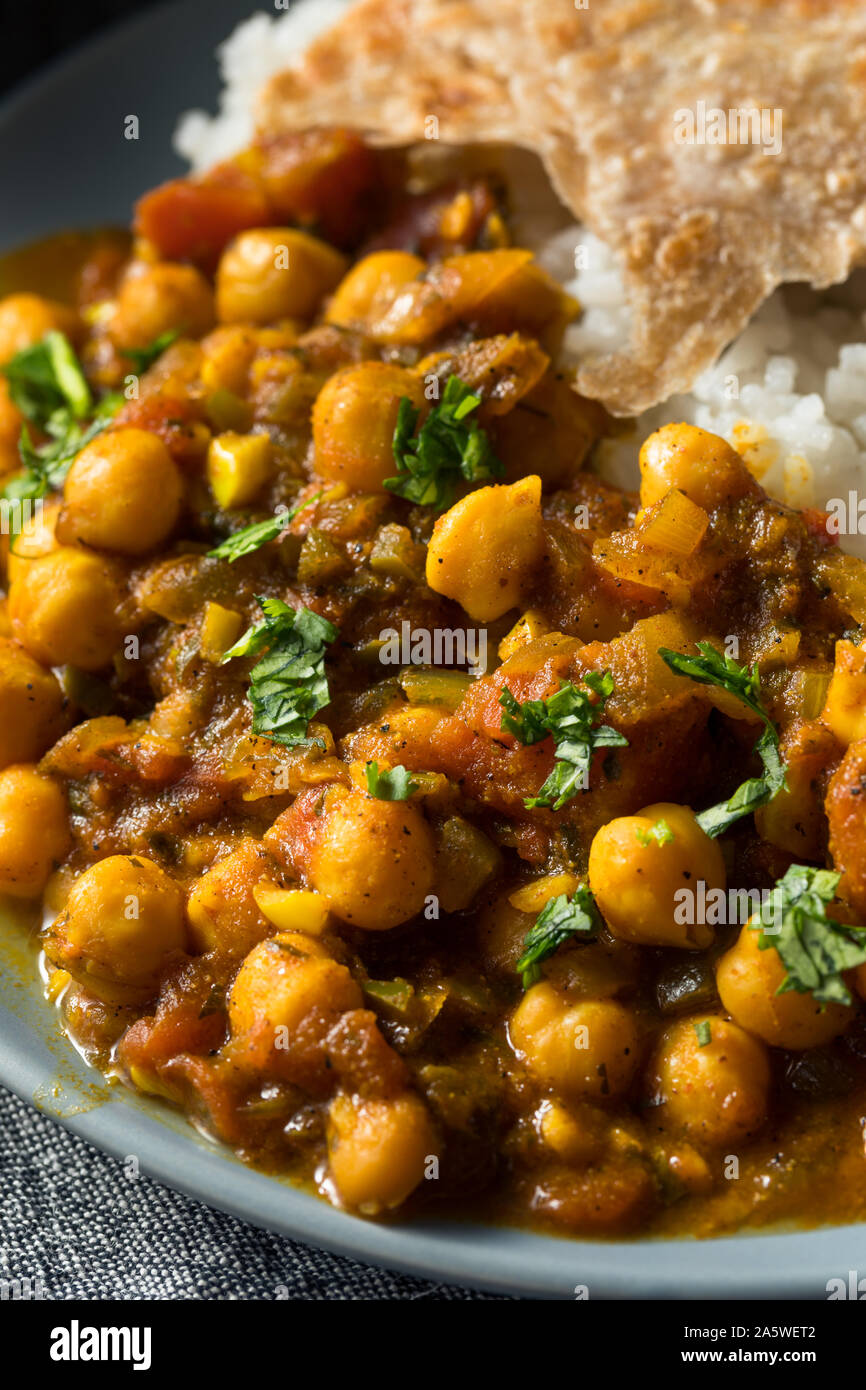 Homemade Indian Chickpea Chana Masala with Rice and Roti Stock Photo ...
