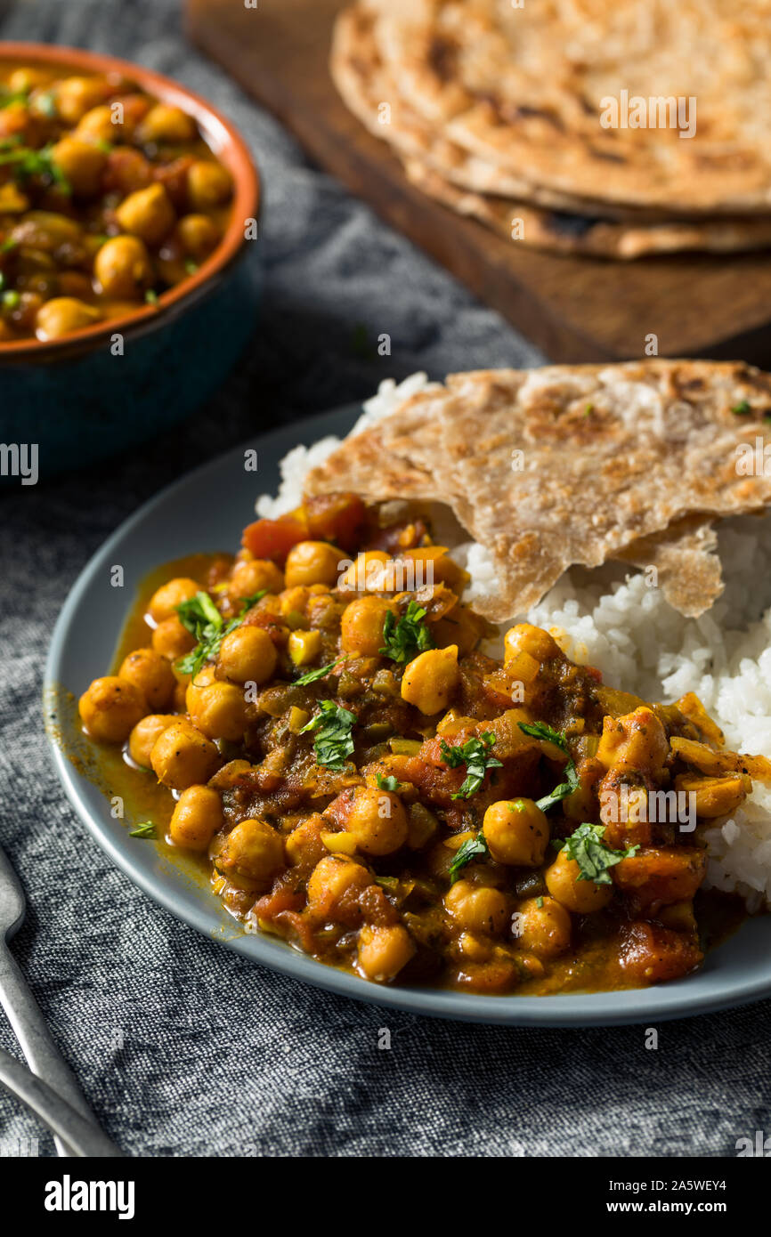 Homemade Indian Chickpea Chana Masala with Rice and Roti Stock Photo ...