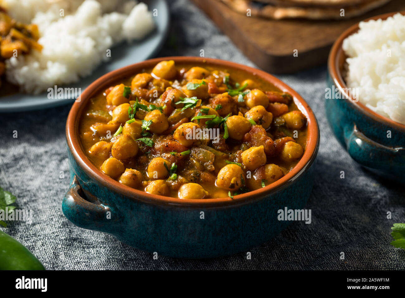 Homemade Indian Chickpea Chana Masala with Rice and Roti Stock Photo ...