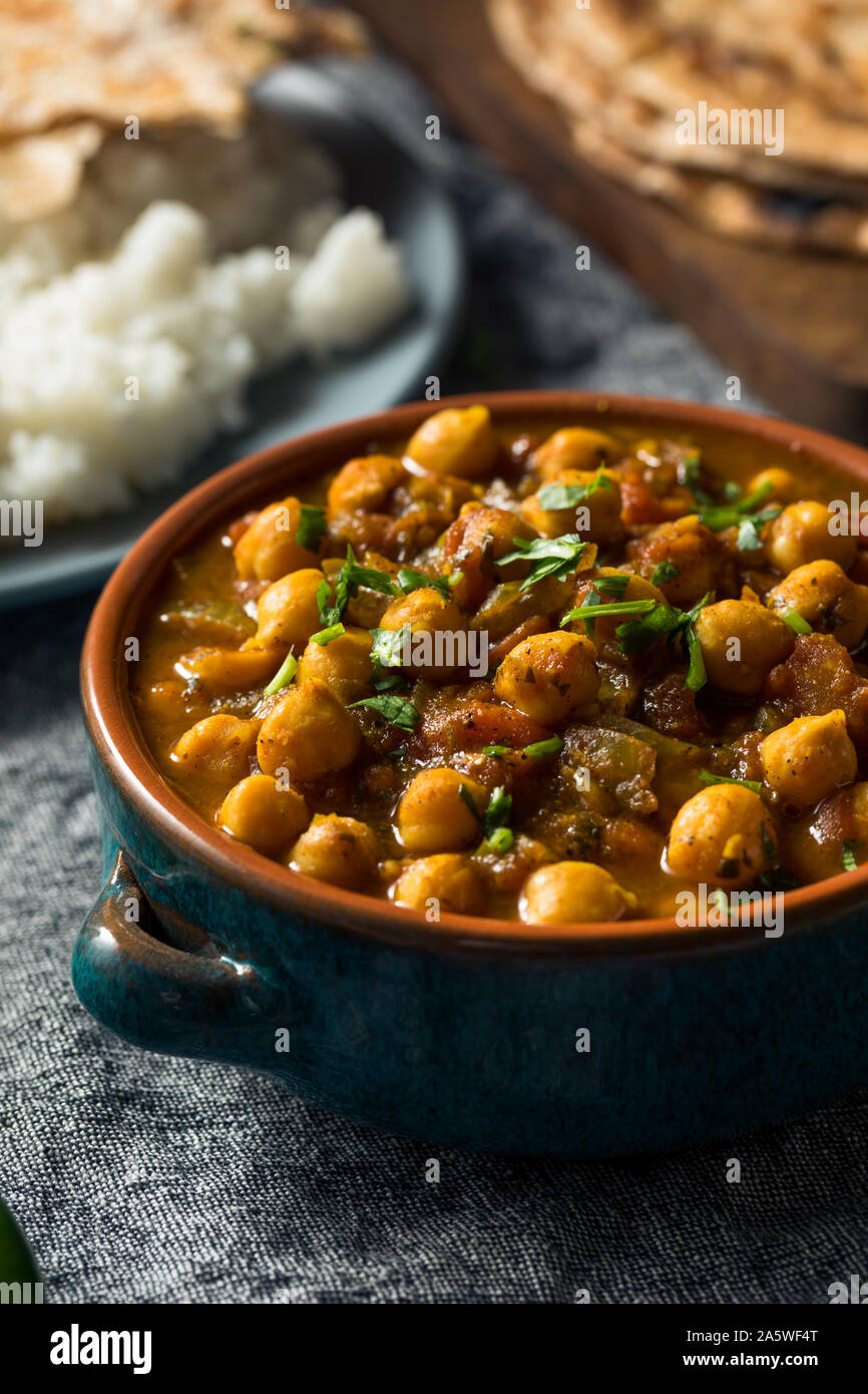 Homemade Indian Chickpea Chana Masala with Rice and Roti Stock Photo ...