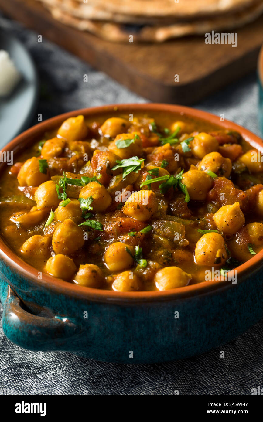 Homemade Indian Chickpea Chana Masala with Rice and Roti Stock Photo ...