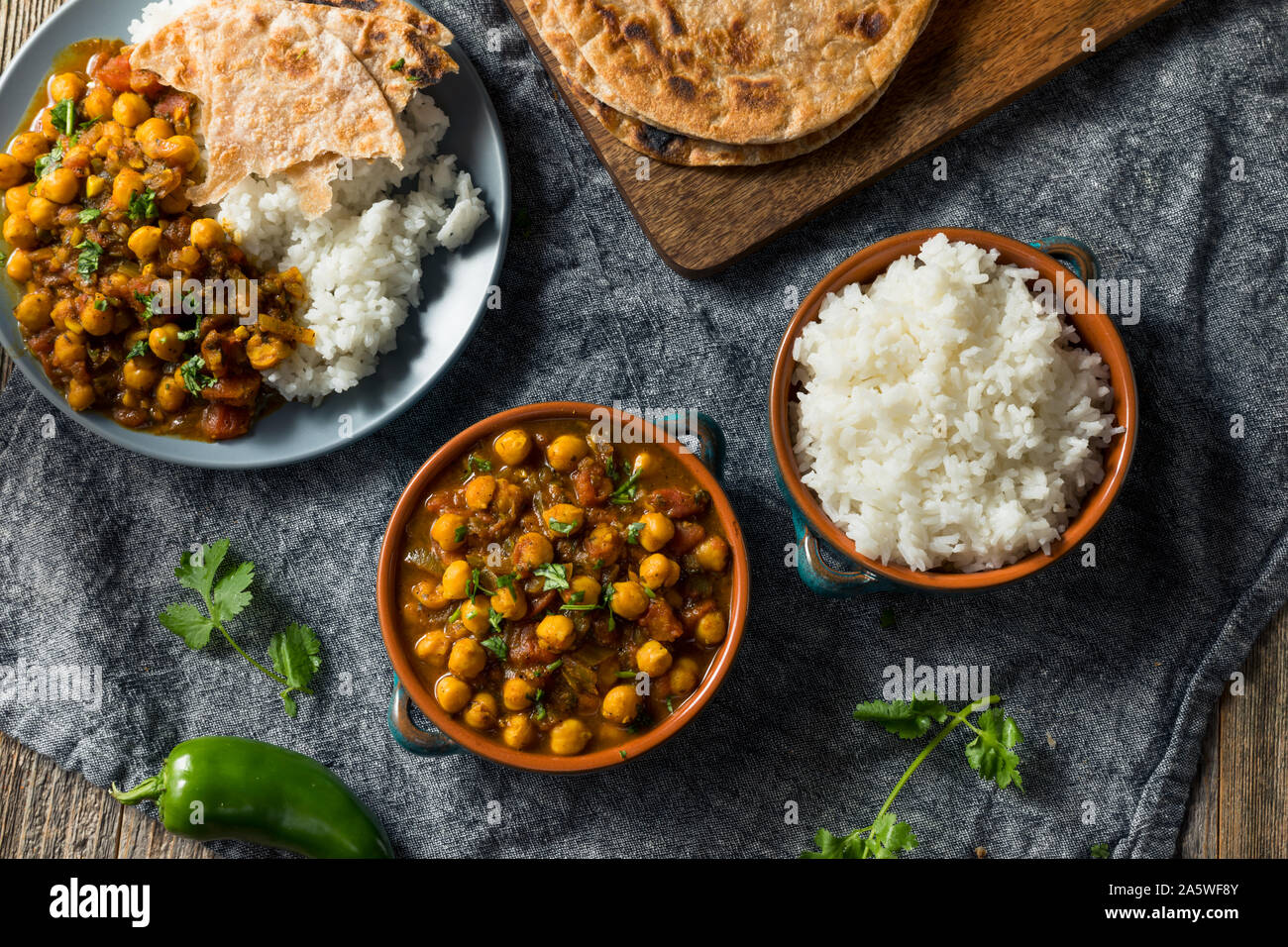 Homemade Indian Chickpea Chana Masala with Rice and Roti Stock Photo ...