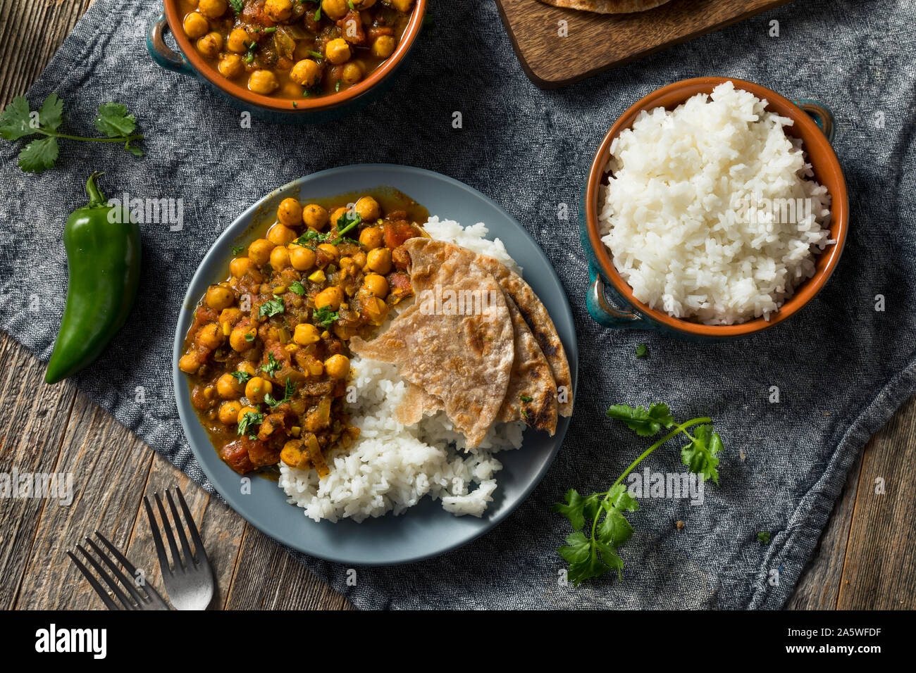 Homemade Indian Chickpea Chana Masala with Rice and Roti Stock Photo ...