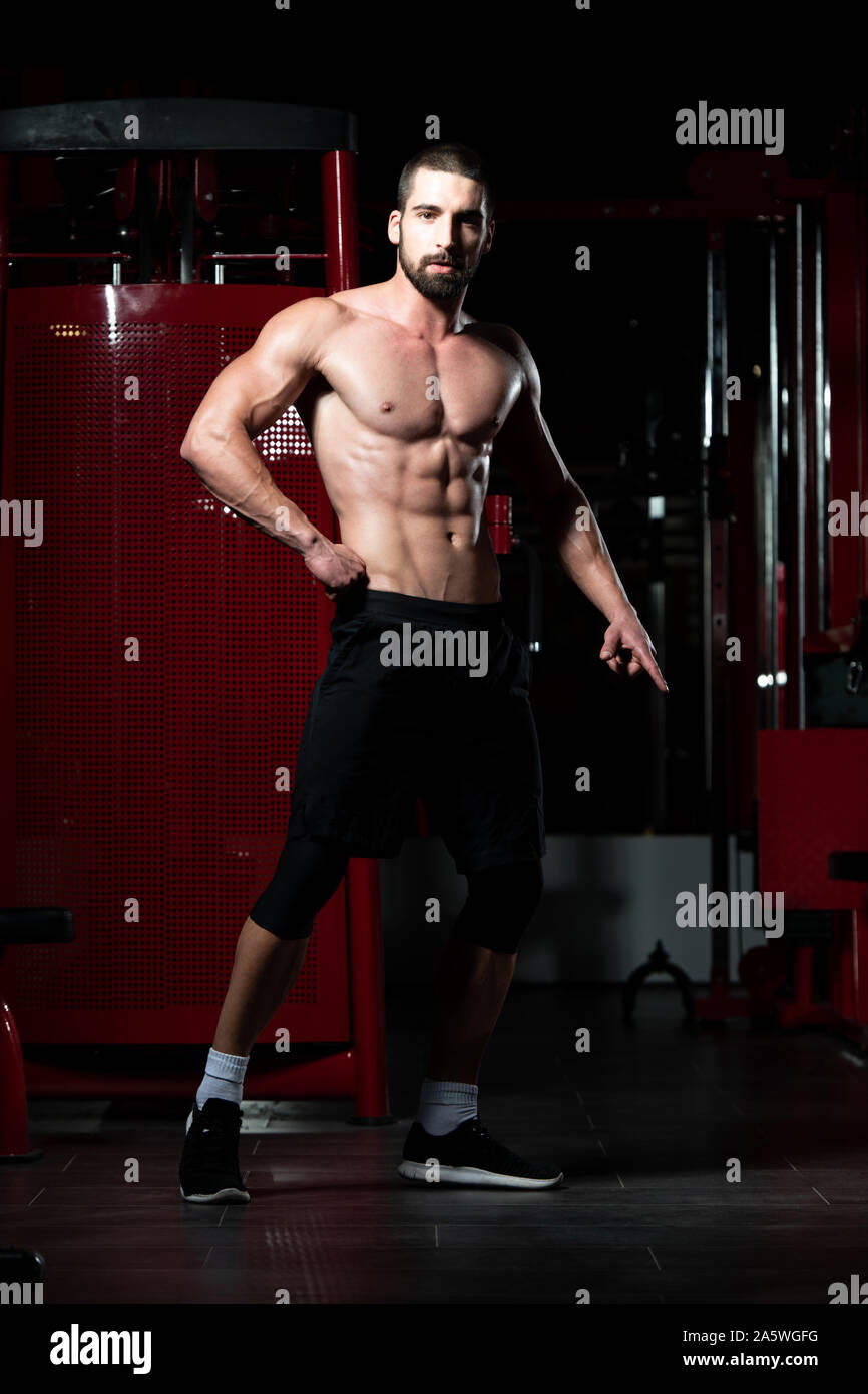 Portrait Of A Young Physically Fit Man Showing His Well Trained Body ...