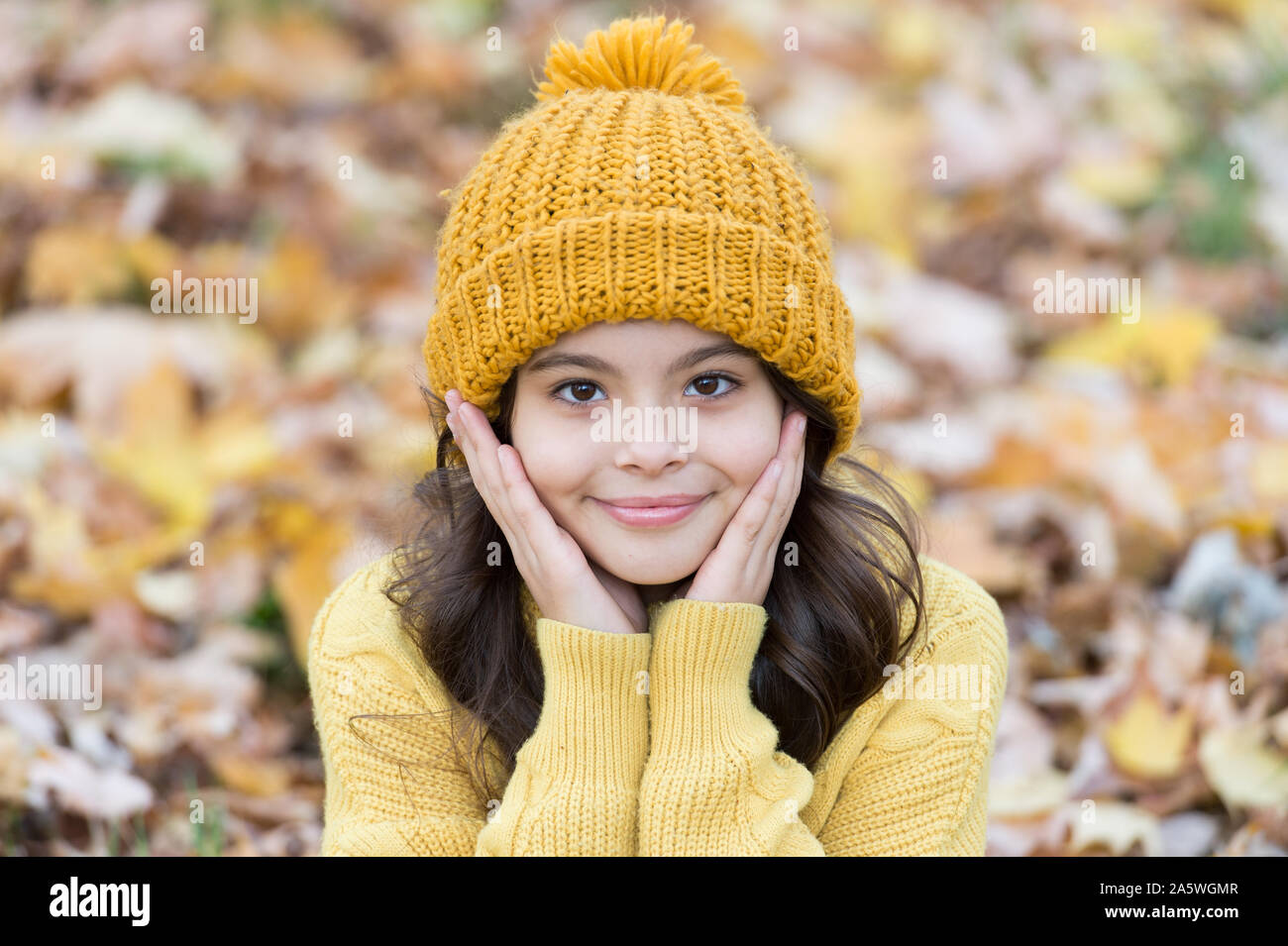 Warm woolen accessory. Girl long hair happy face autumn nature ...