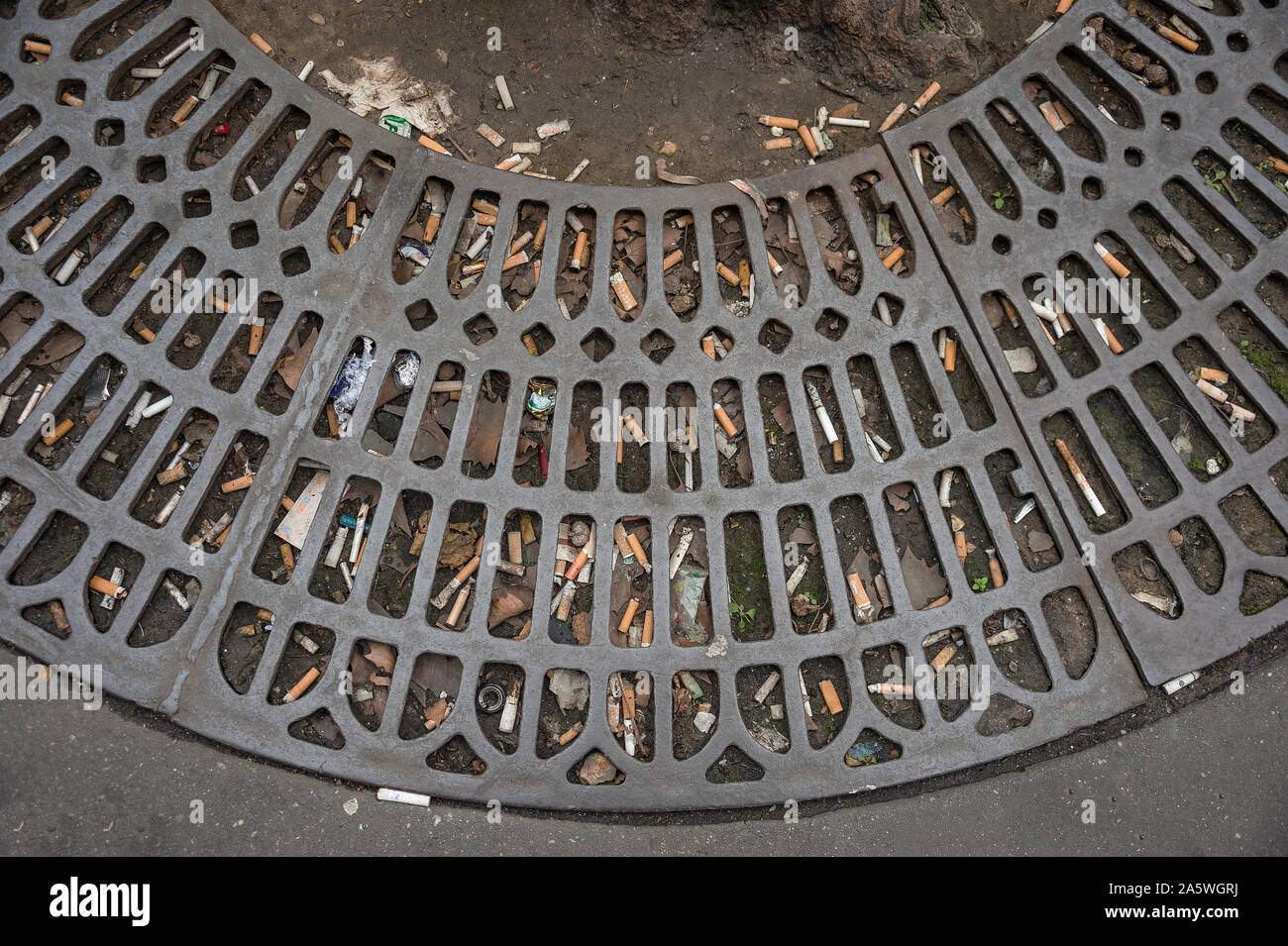 Cigarette butts one of the most littered items drop through the holes ...