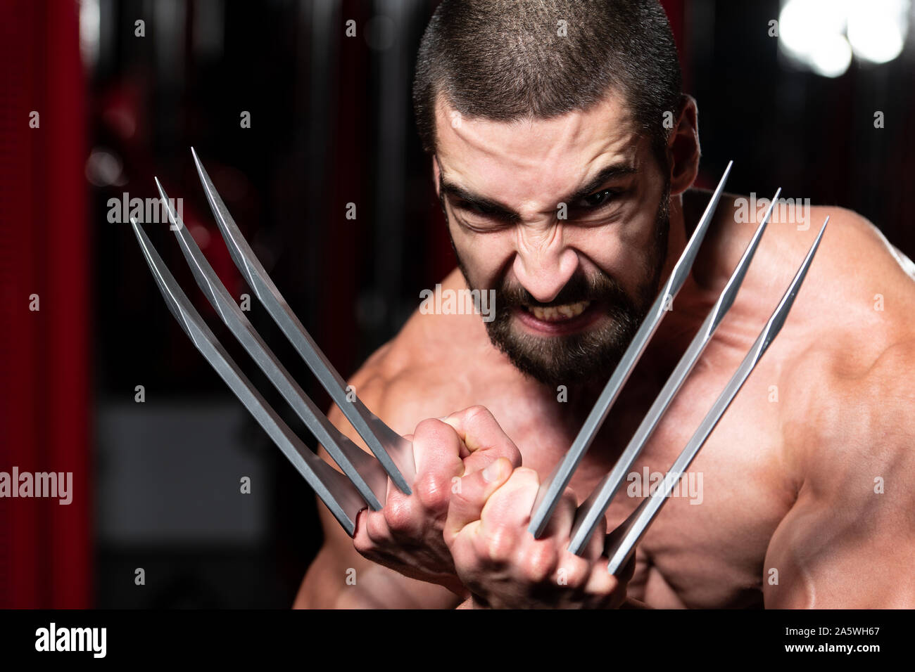 Superhero With Claws Standing Strong Flexing Muscles - Muscular ...