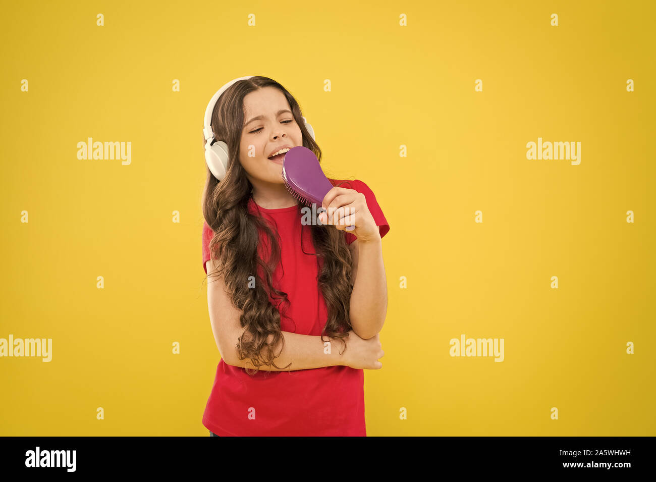 Keep a song in your heart. Adorable song singer. Cute small child doing ...