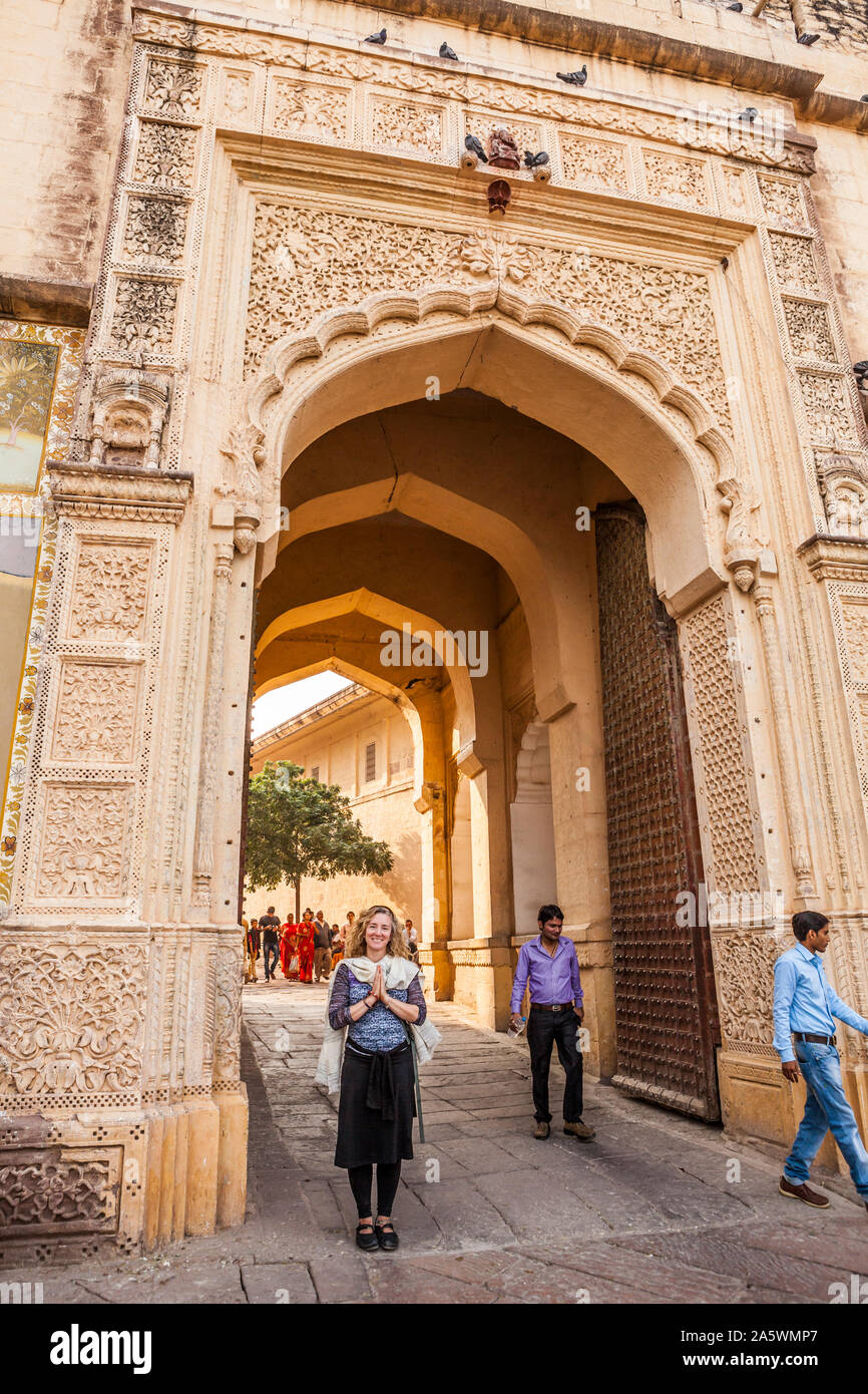 A western tourist woman at the gates to Mehrangarh Fort, Jodhpur ...