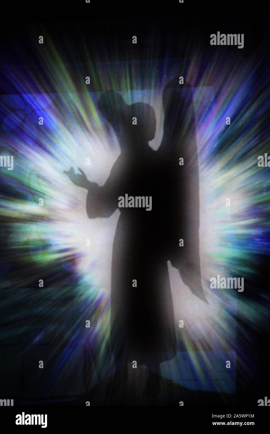 Angel surrounded by light hi-res stock photography and images - Alamy