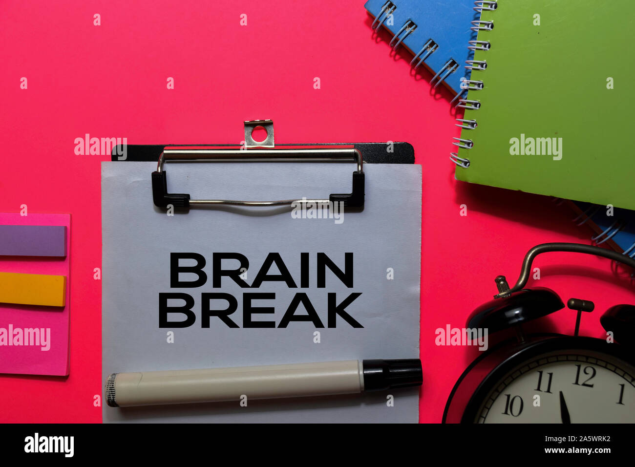 Brain Break write on paperwork. Isolated on pink table background Stock ...