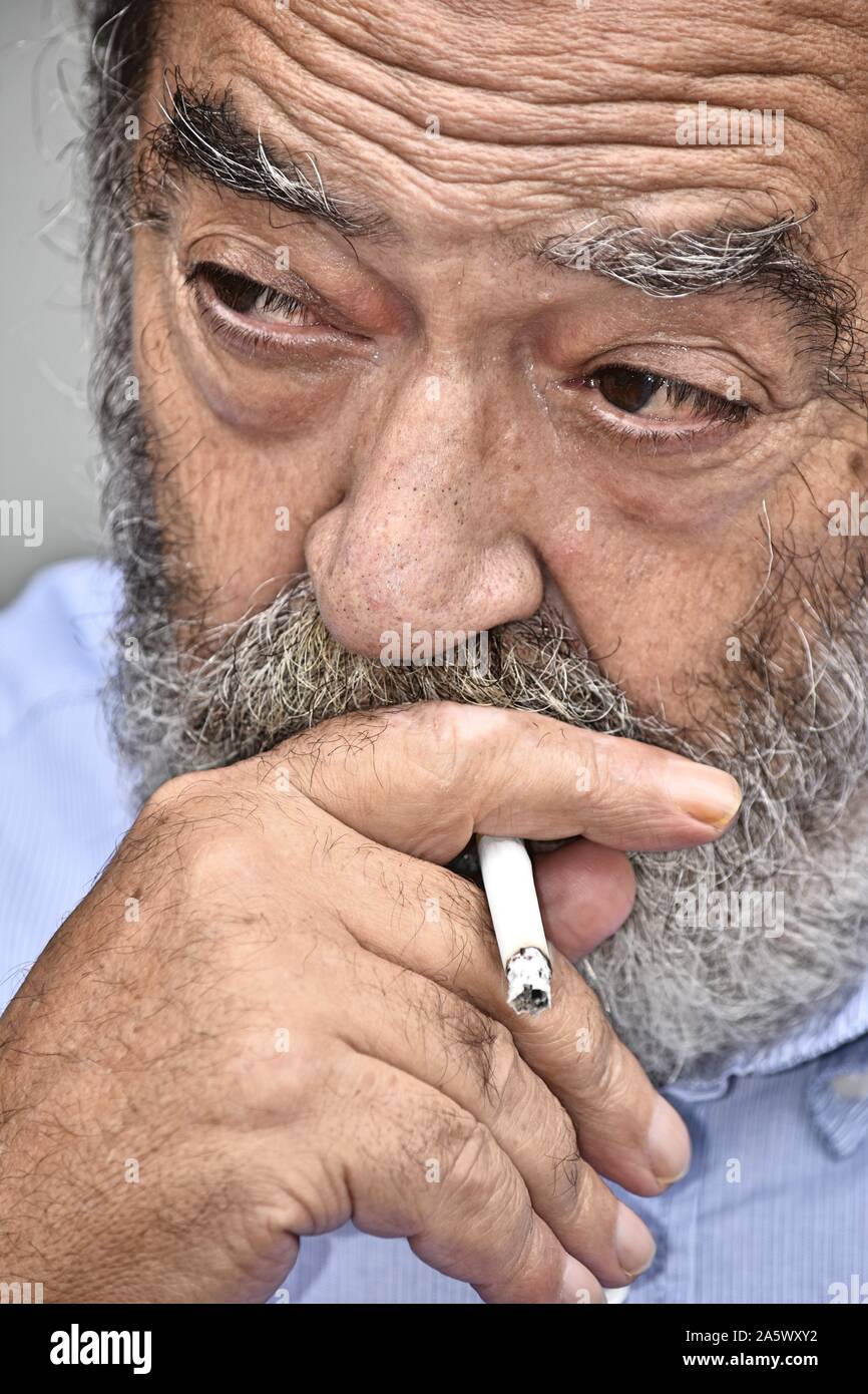 Colombian Male Smoking Stock Photo - Alamy