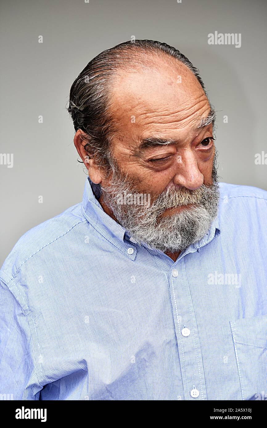 Senior Male Winking Stock Photo - Alamy