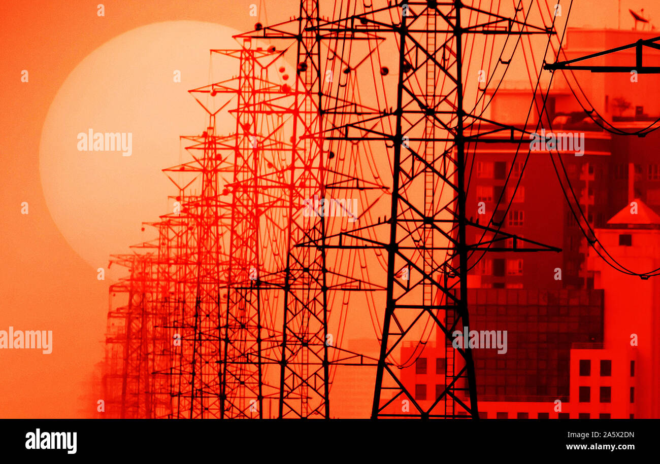 Sun, high voltage electricity towers, buildings, plants, in the modern ...