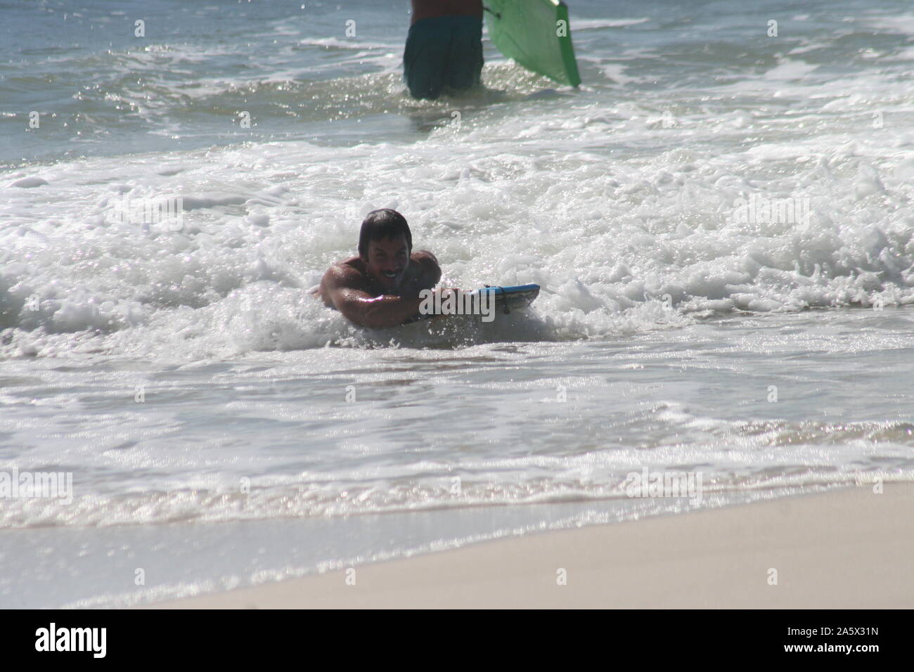 Body surfing hi-res stock photography and images - Alamy