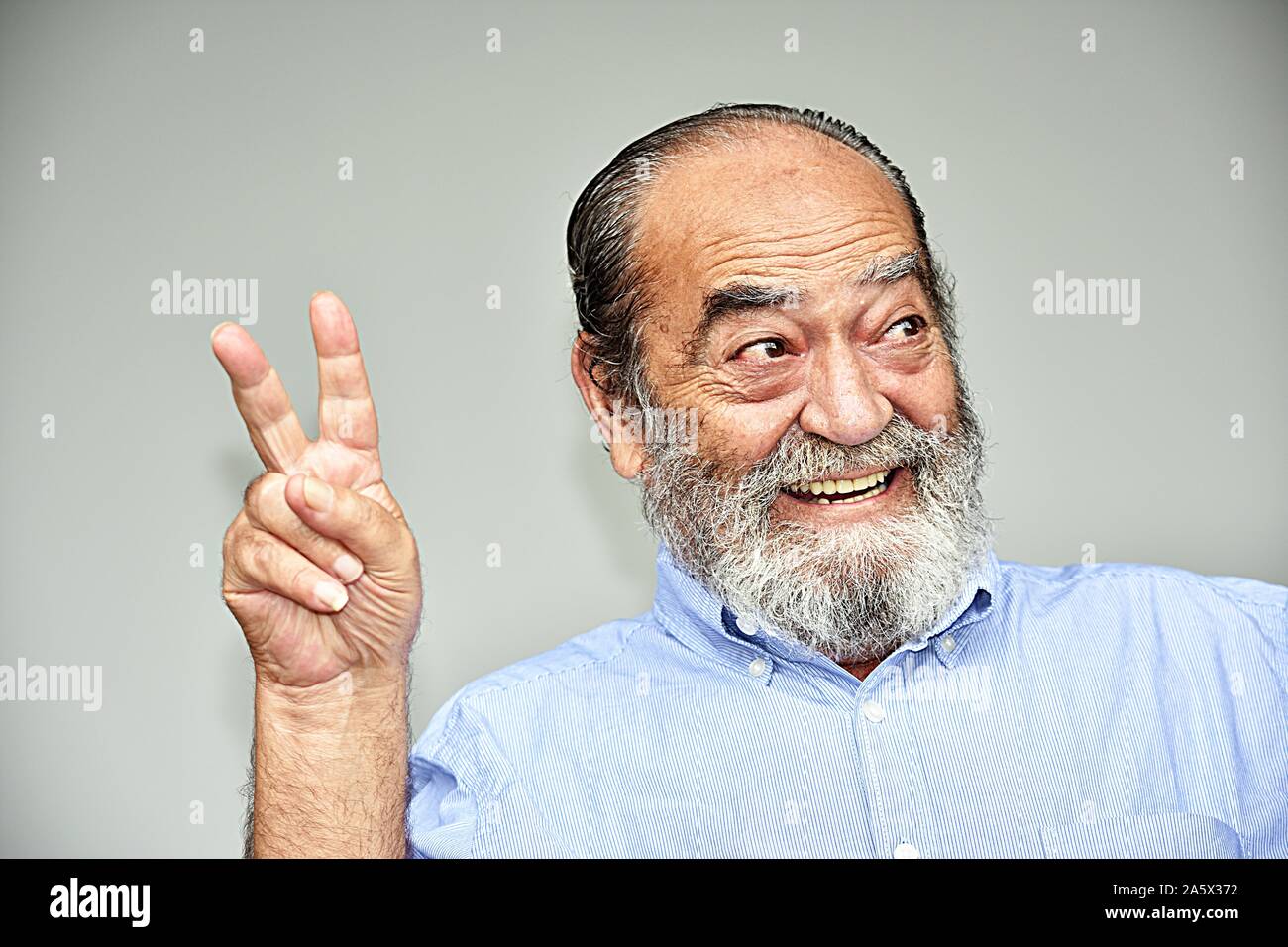 An Adult Male And Peace Sign Stock Photo - Alamy