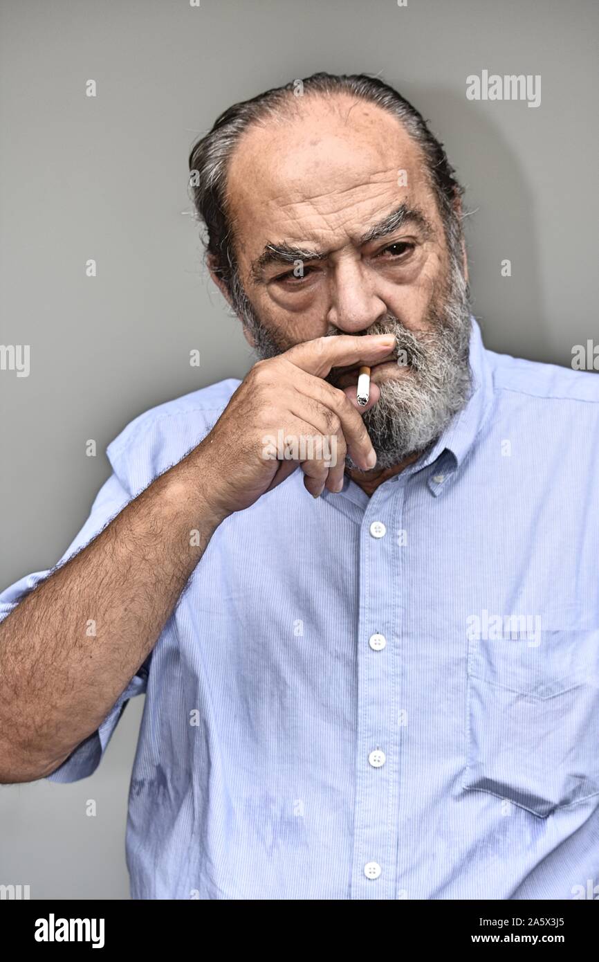 Smoking senior hi-res stock photography and images - Alamy
