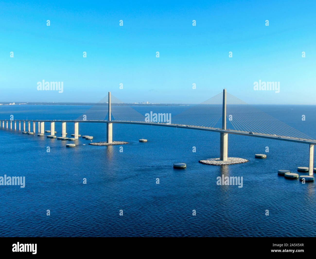 Aerial view of Sunshine Skyway, Tampa Bay Florida, USA. Big steel cable ...