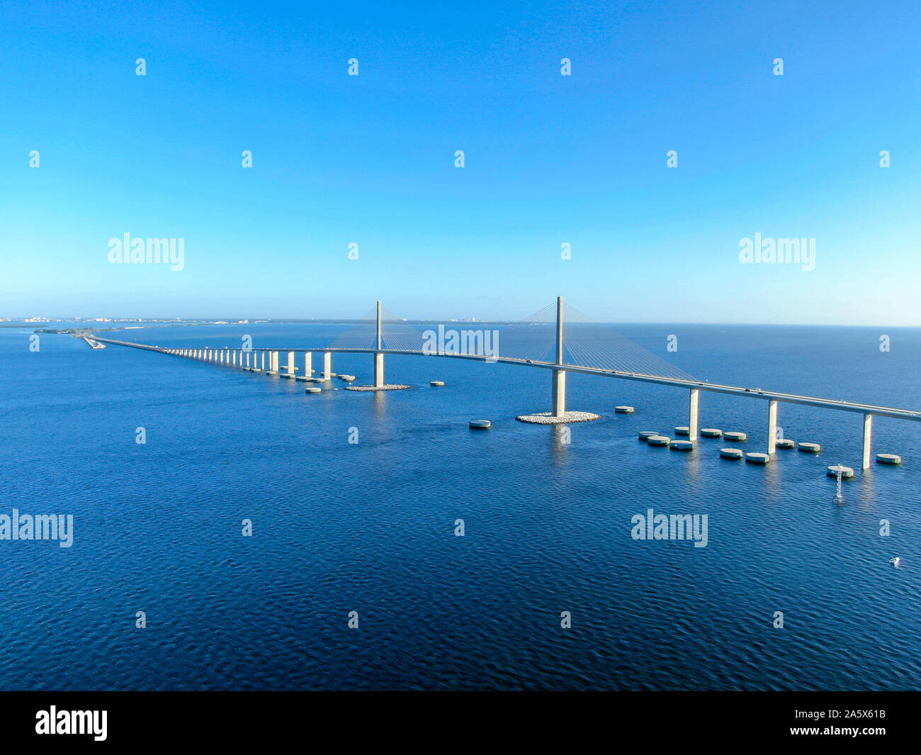 Aerial view of Sunshine Skyway, Tampa Bay Florida, USA. Big steel cable ...