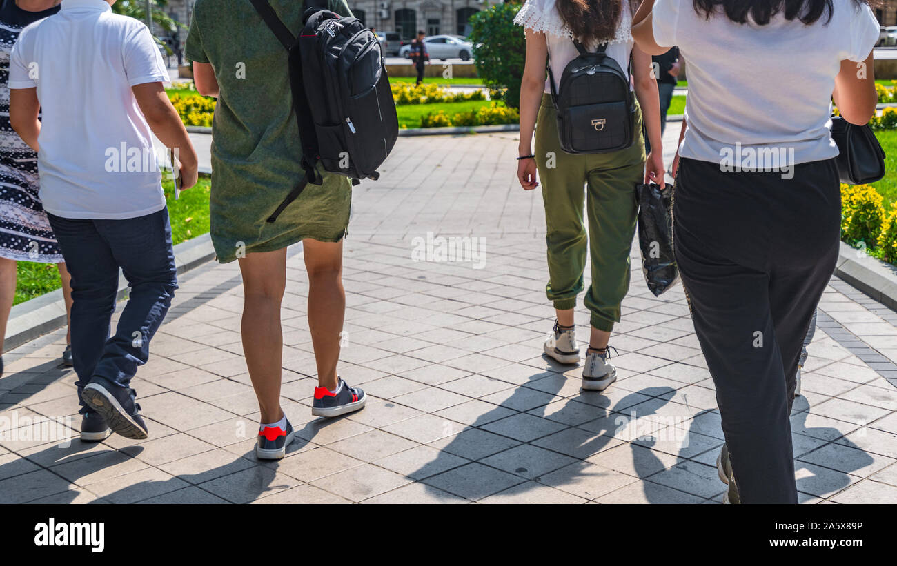 Walking people pedestrians rear view Stock Photo - Alamy