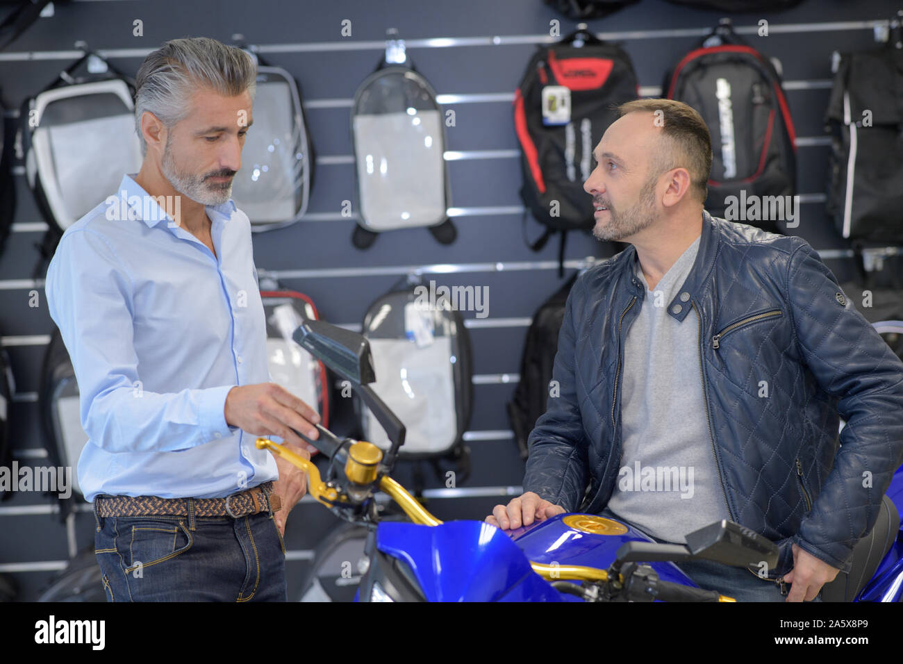 a motorcycle dealership in store Stock Photo - Alamy