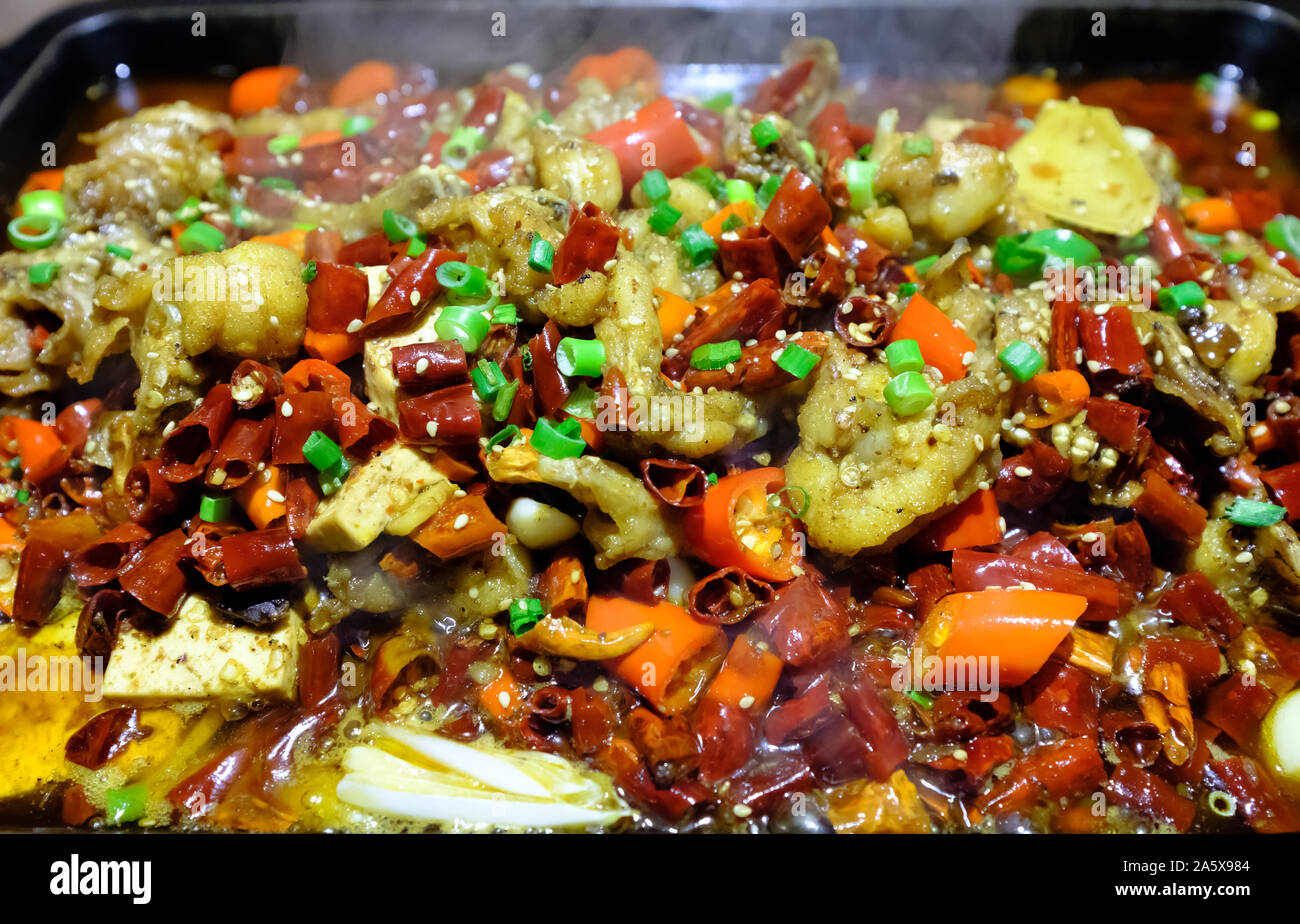 spicy frog with Green Spring Onions closeup Stock Photo - Alamy