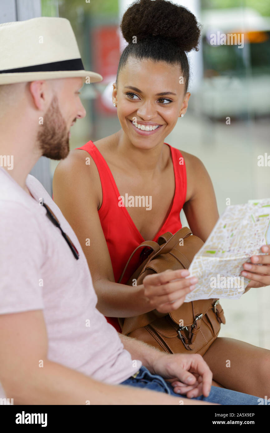 couple checking where to go Stock Photo - Alamy