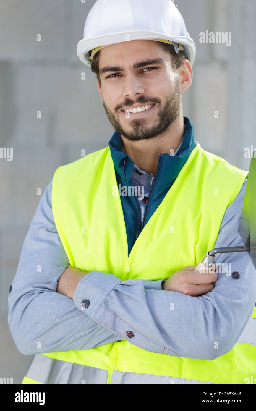 confident builder outdoors in construction site Stock Photo - Alamy