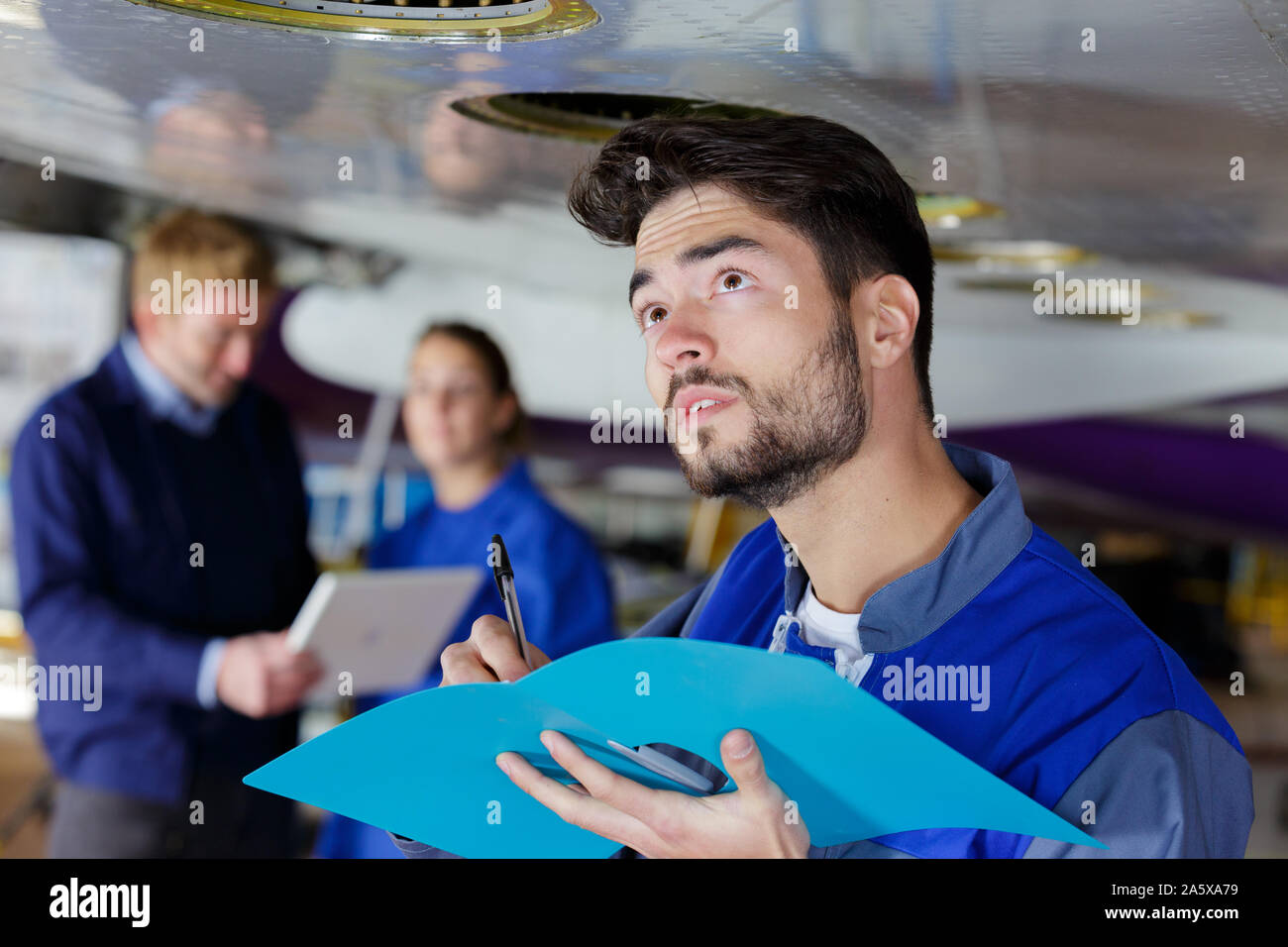 an engineer under heavy maintenance Stock Photo - Alamy