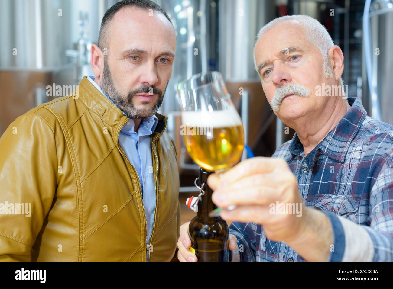 portrait of men with beer glass Stock Photo - Alamy