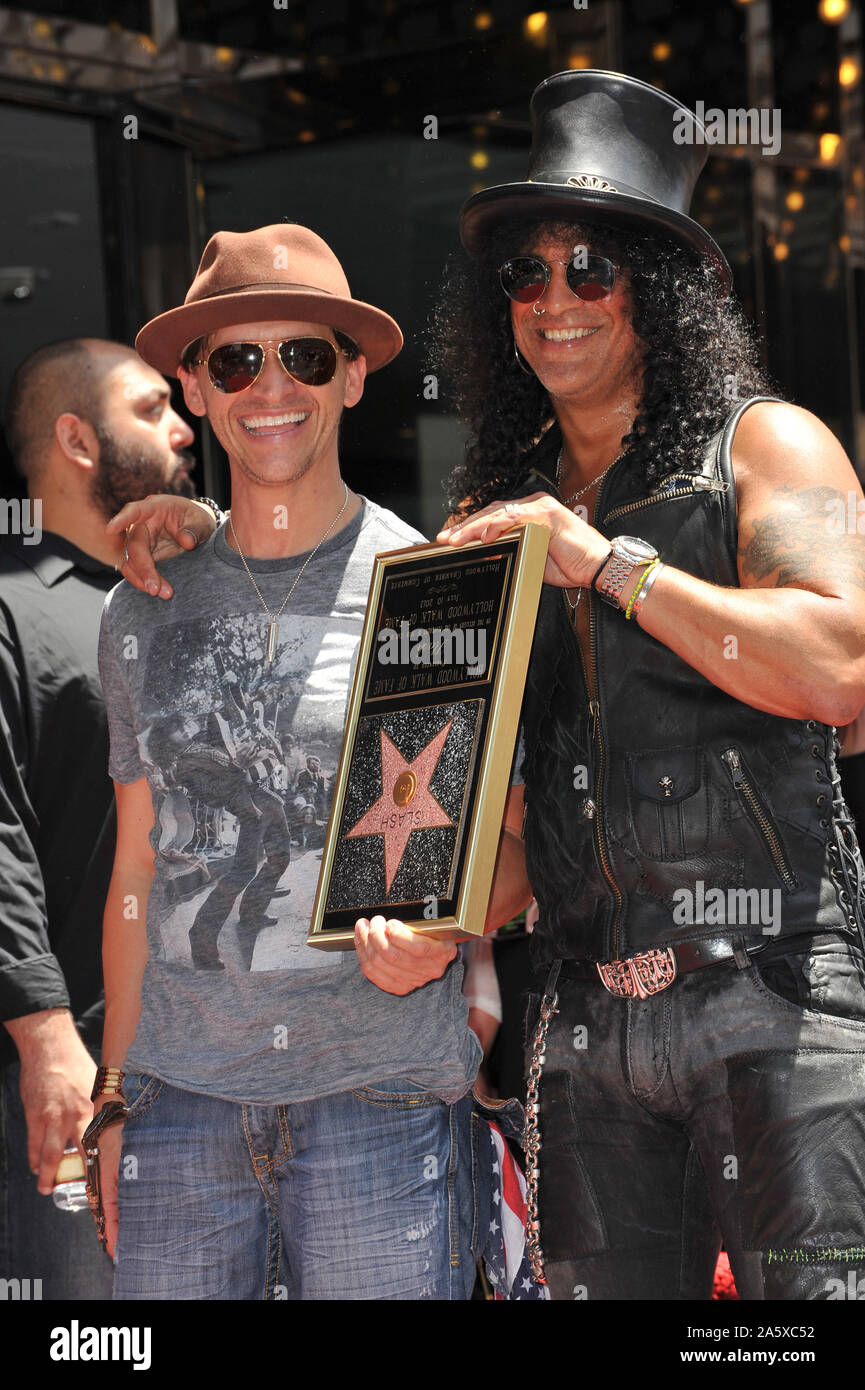 LOS ANGELES, CA. July 10, 2012: Rock guitarist Slash & actor Clifton ...