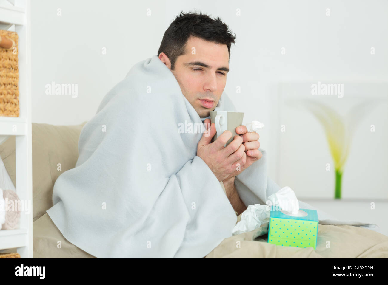 sick ill man in the bed taking medicines and drugs Stock Photo - Alamy