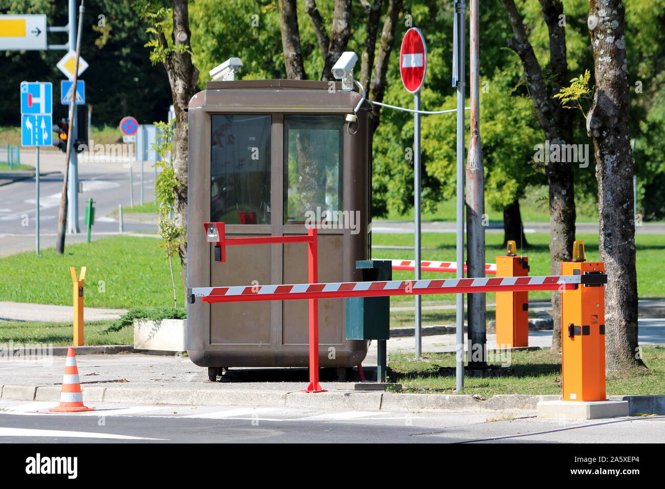 Red security barriers hi-res stock photography and images - Alamy
