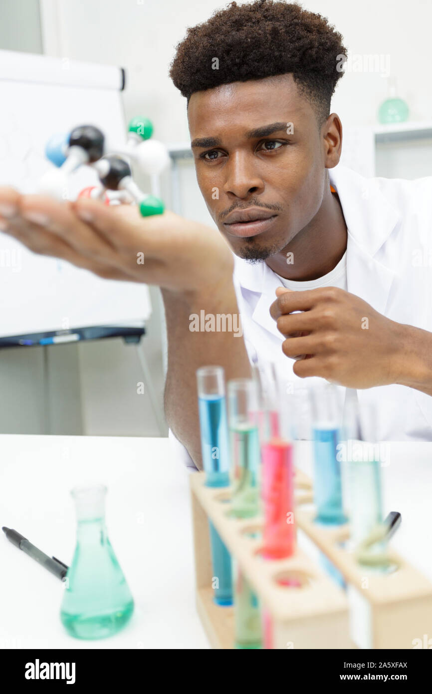 a young man constructs molecule Stock Photo - Alamy