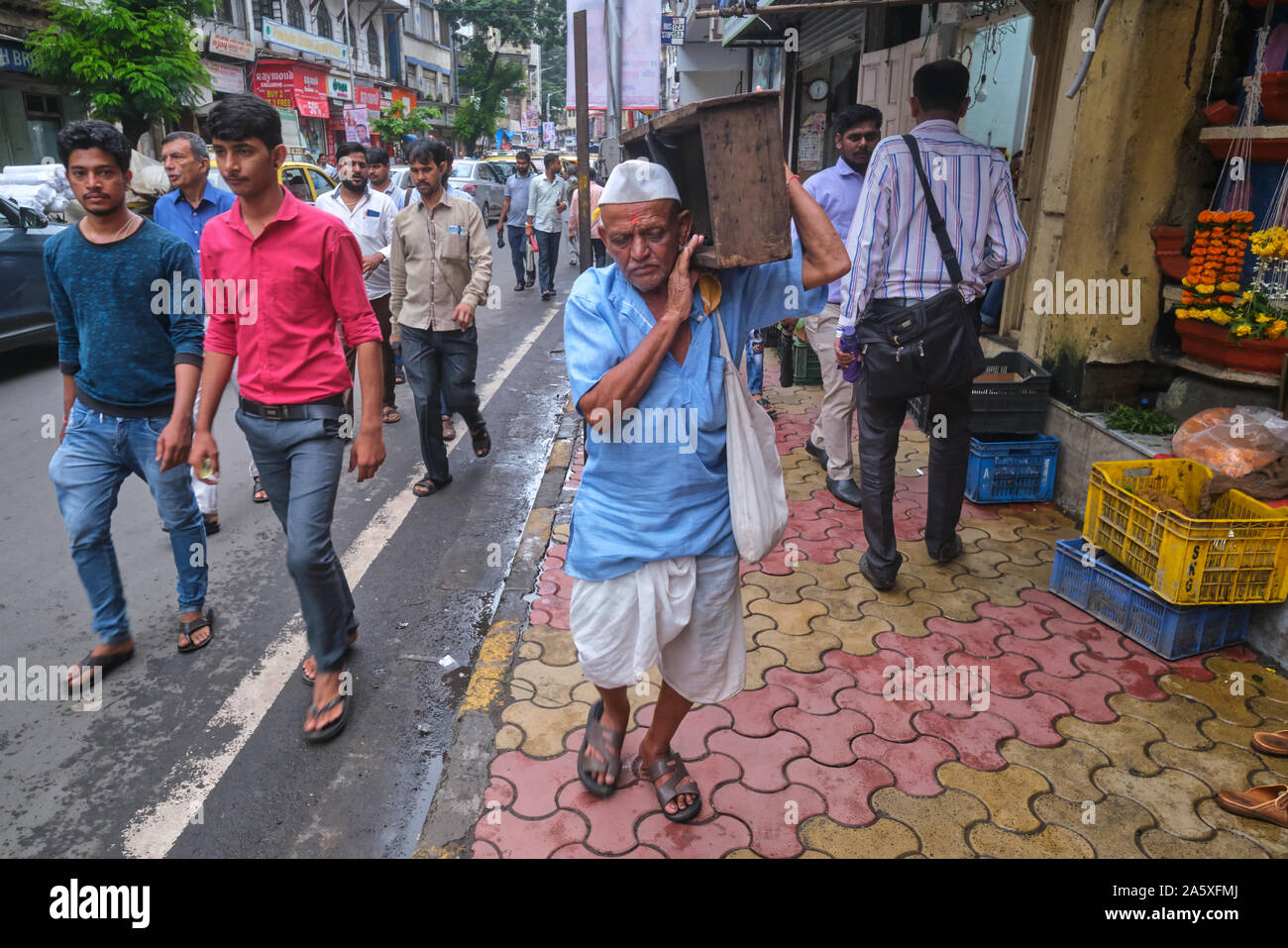 A traditionally dressed Maharashtrian man in business area Kalbadevi ...