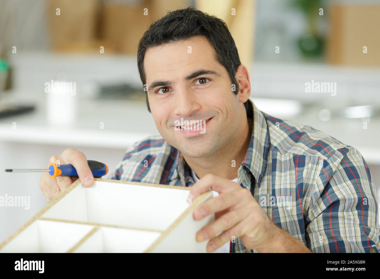 Mending furniture hi-res stock photography and images - Alamy