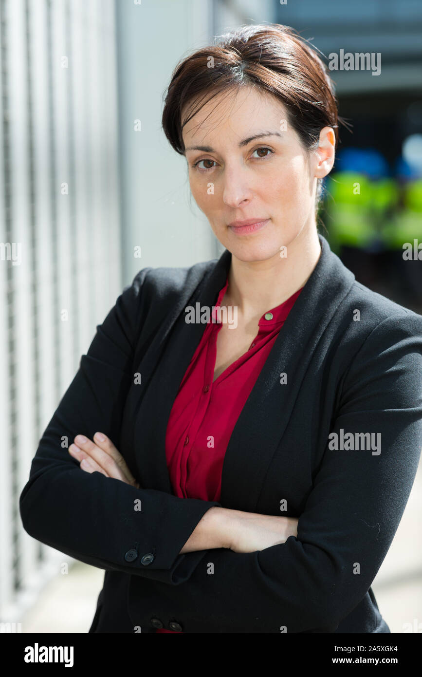 serious businesswoman with arms crossed Stock Photo - Alamy