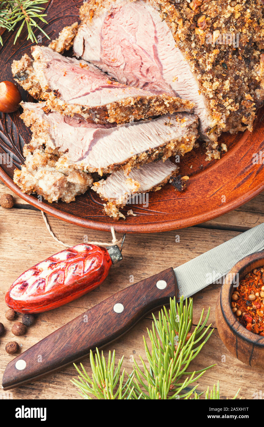 Baked meat under a bread crust.Roasted beef Stock Photo - Alamy