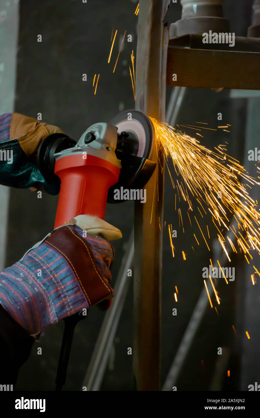 Hands man working grinder hi-res stock photography and images - Alamy